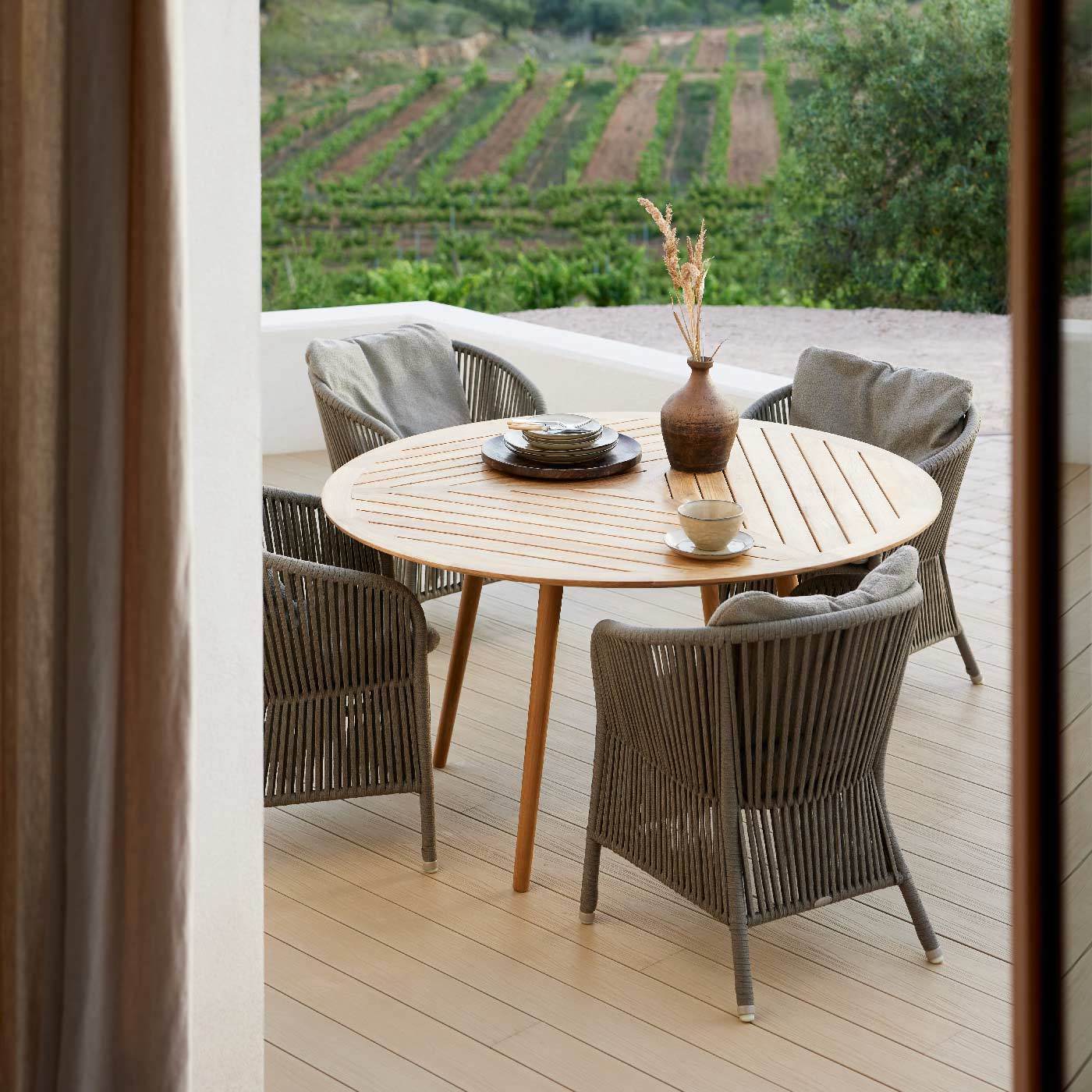 Define Teak Table | Caneline Circular Garden Tables